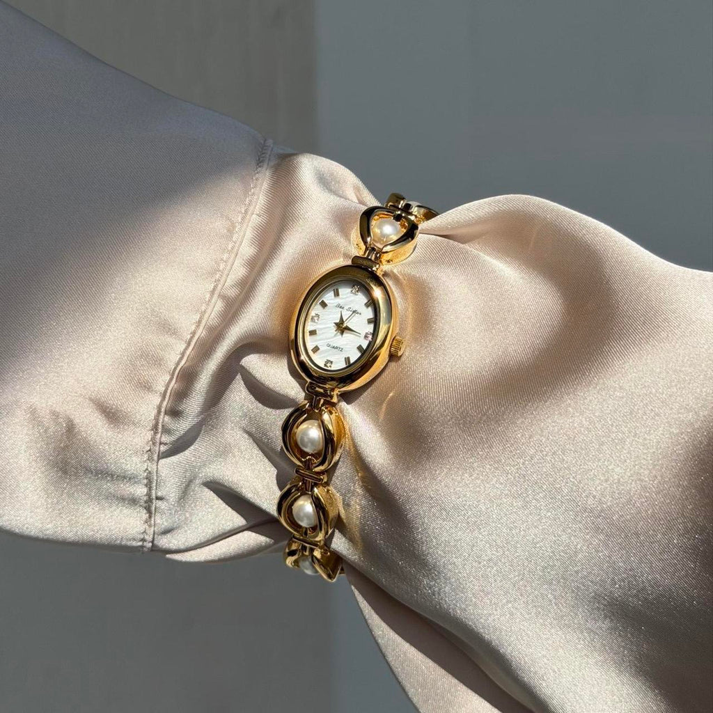 HOME WATCHES NECKLACES BRACELETS EARRINGS RINGS
